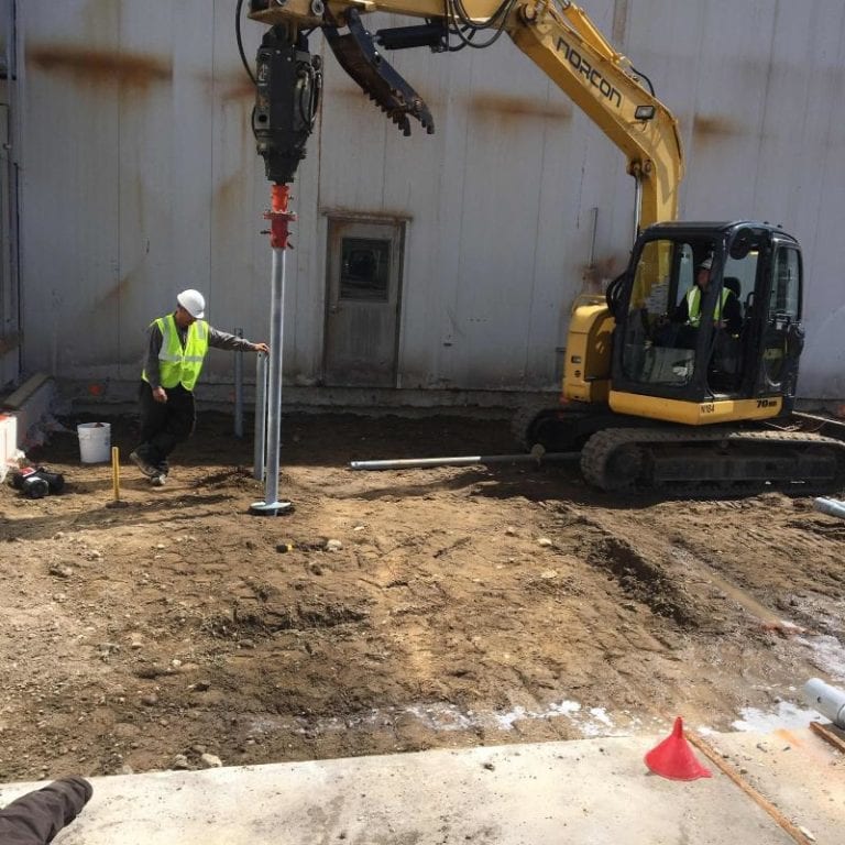 Installation of Helical Piers and Pile Caps – Norcon Corp