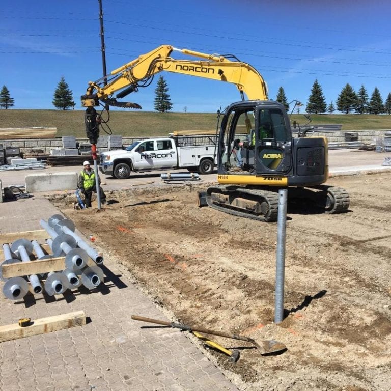 Installation of Helical Piers and Pile Caps – Norcon Corp