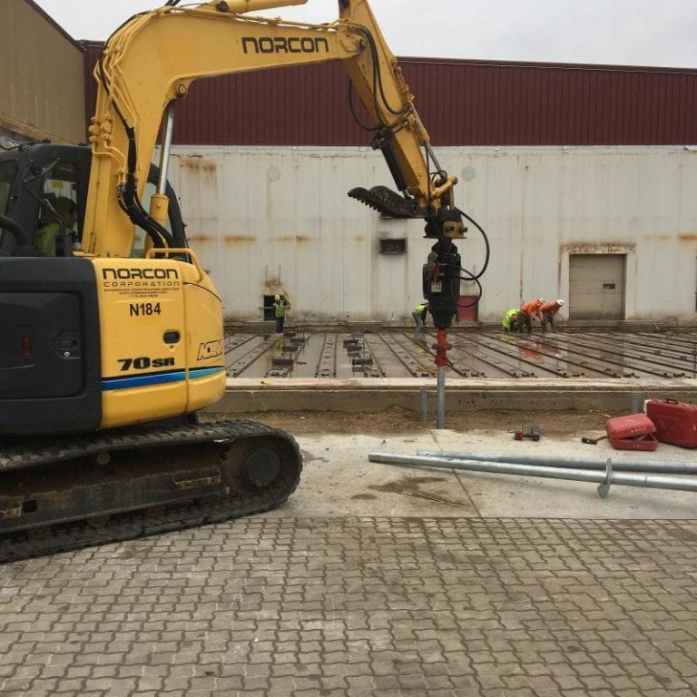 Installation of Helical Piers and Pile Caps – Norcon Corp